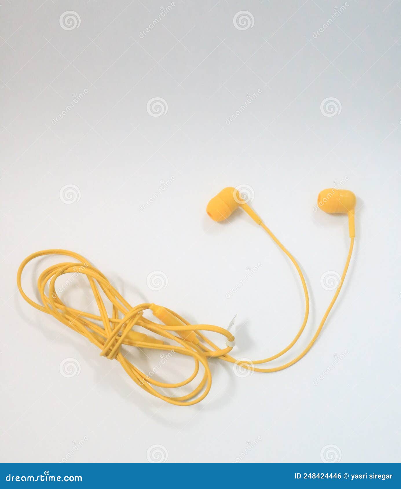 Miniso Yellow Handsfree Headset Phone Accecory Stock Photo - Image of ...