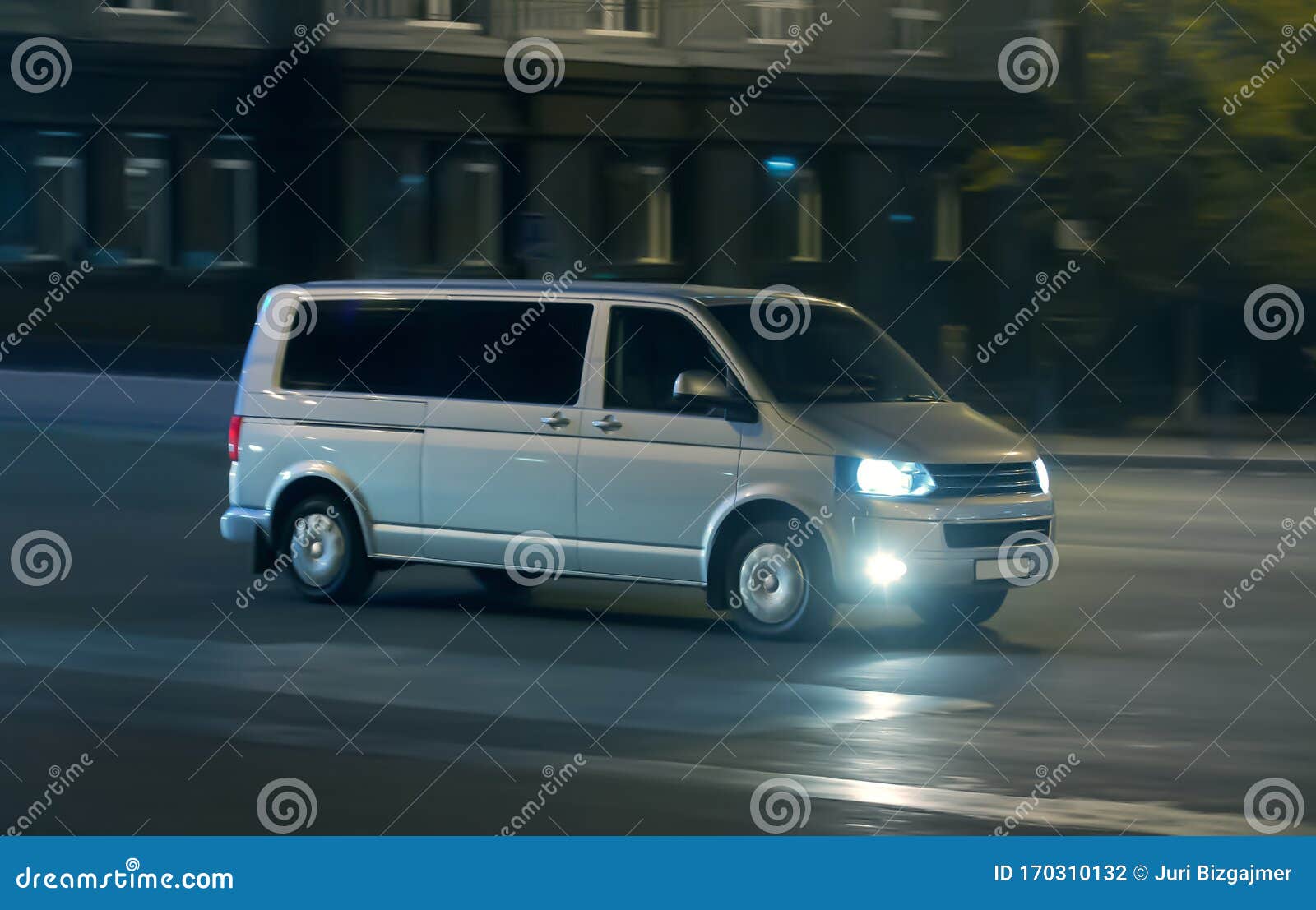 Minivan Moves at Night on a City Street Stock Photo - Image of fast ...