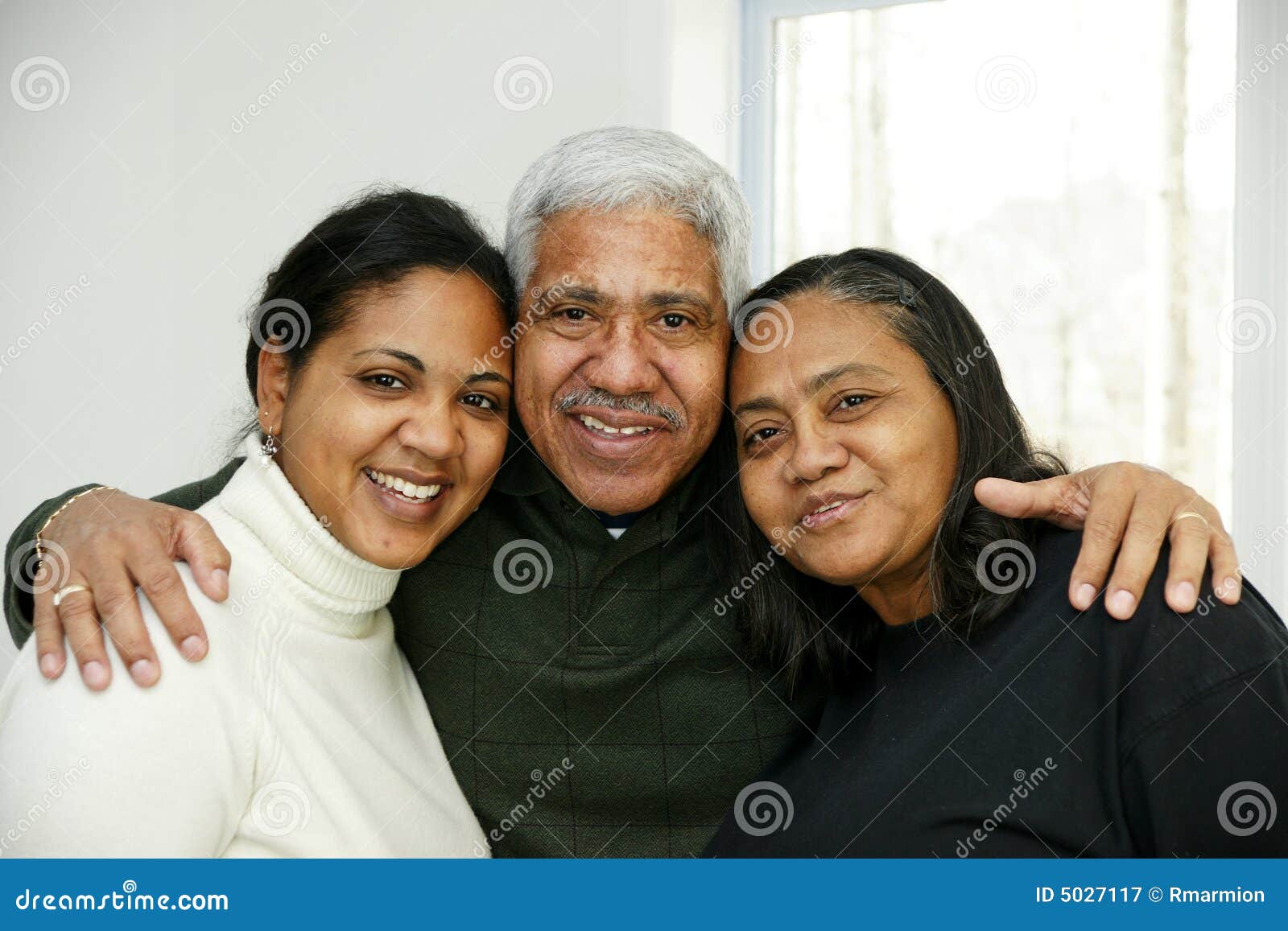 Minority Family stock image. Image of inside, love, mixed - 5027117