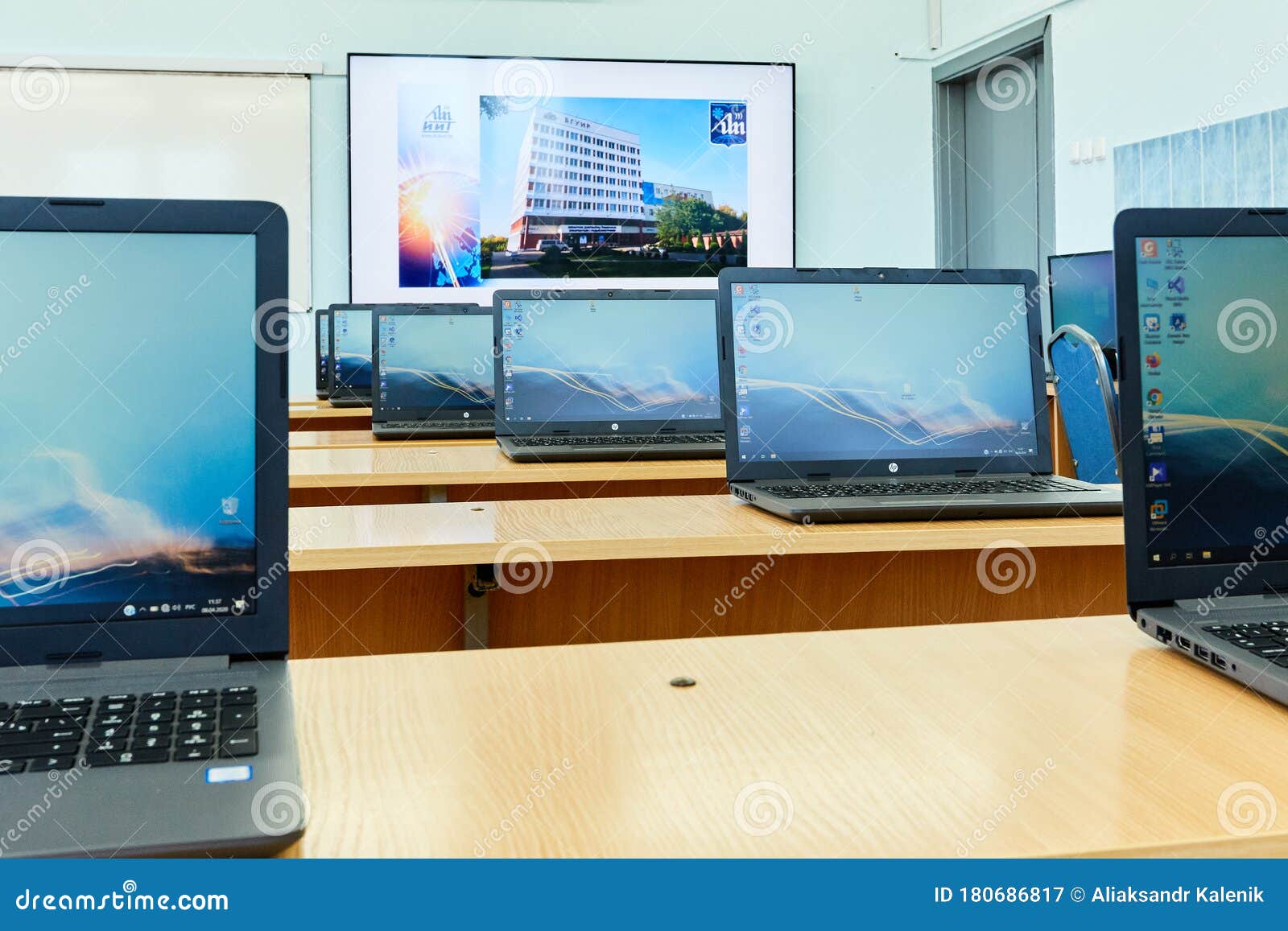 Minsk, Belarus, April, 6, 2020. a Row of Laptops Stands on the Tables ...