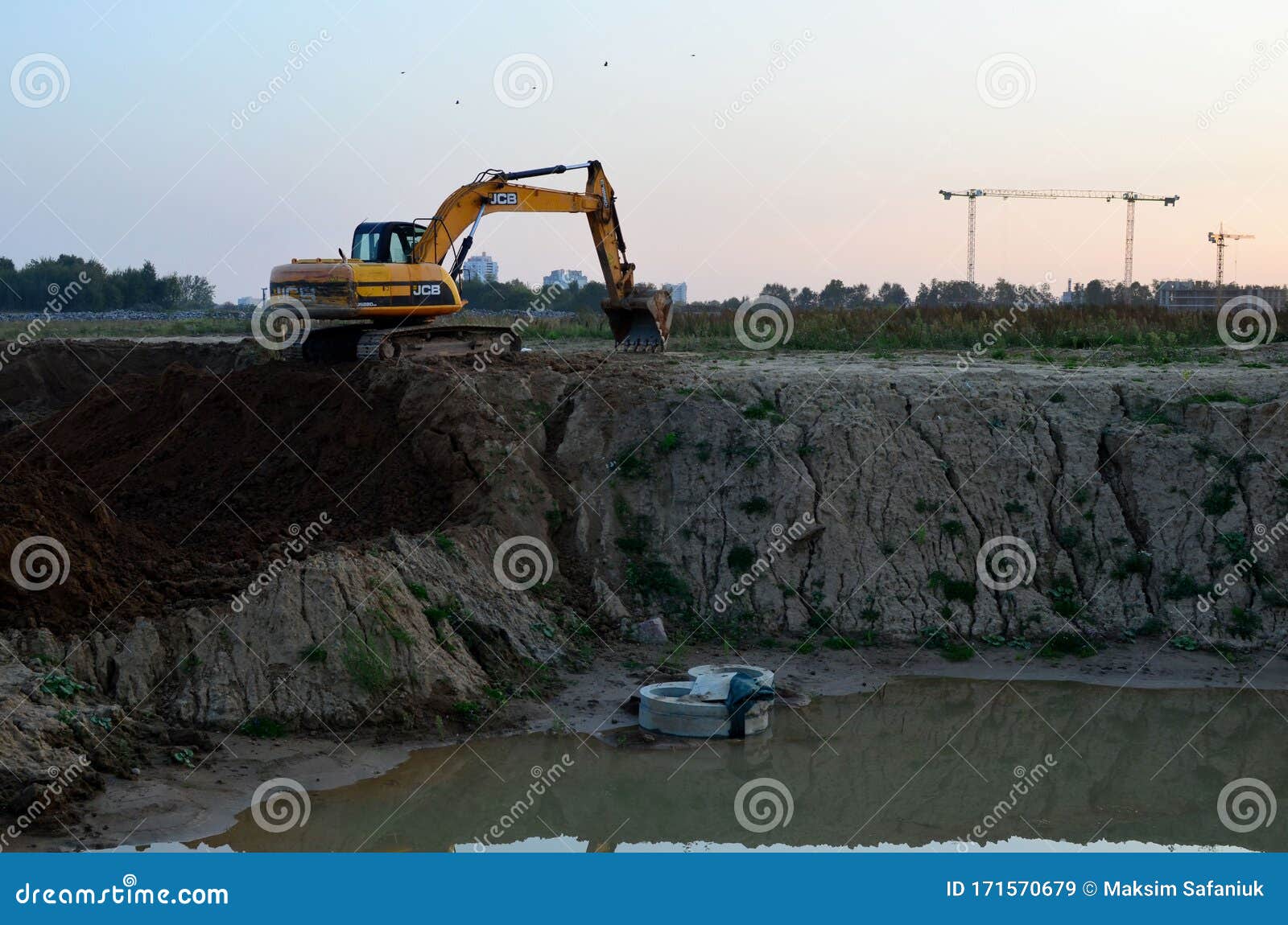Excavator JCB JS 220 SC in a Working at Construction Site Editorial ...
