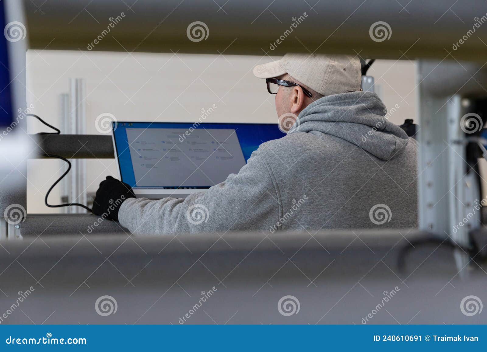 Minsk, Belarus - Jan 05, 2022: Photo of a Man in a Gray Suit Checking ...
