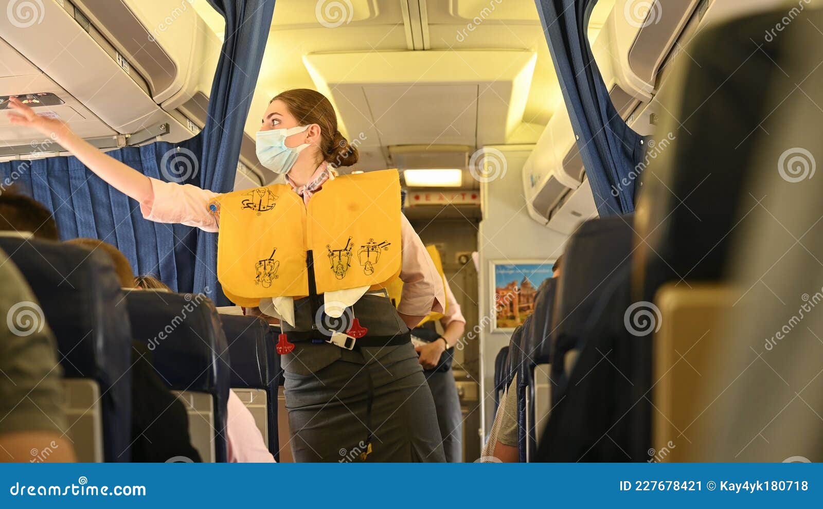 Minsk, Belarus - June 5, 2021: the Stewardess Shows the Safety Rules on ...