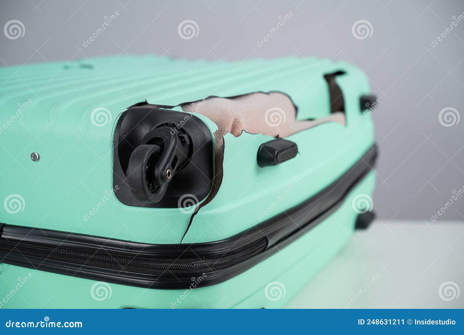 Mint Damaged Suitcase on a White Background. Stock Image - Image of ...