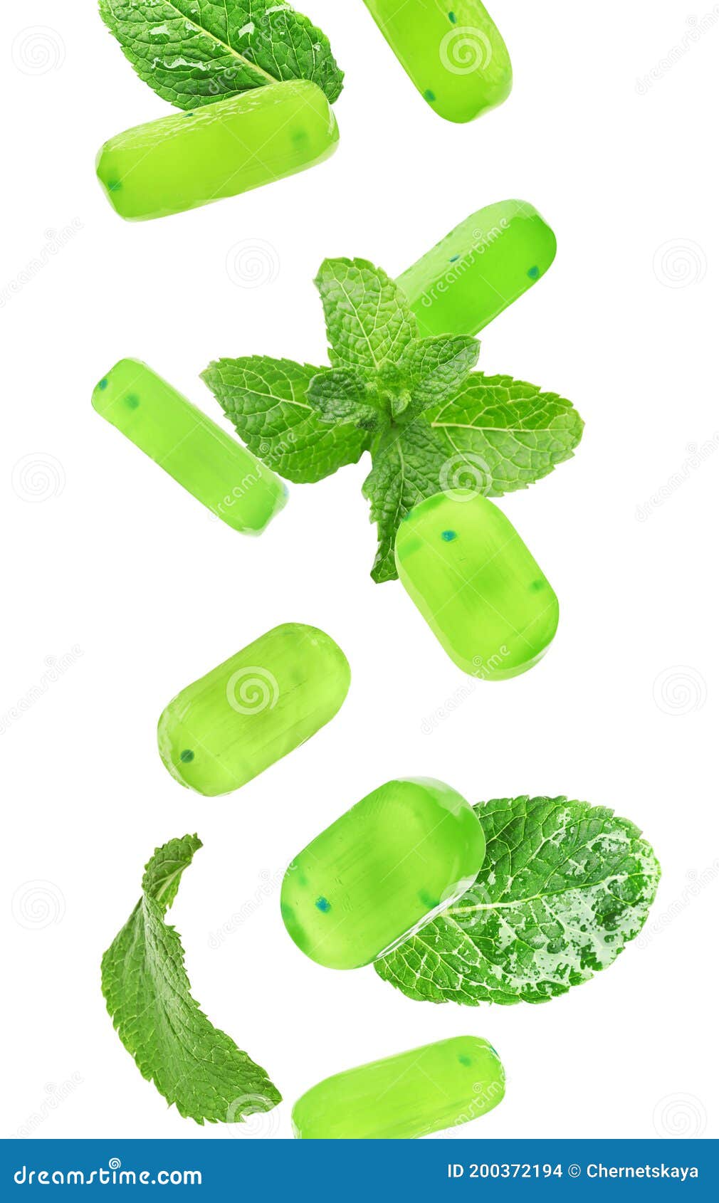 Mint Hard Candies and Green Leaves Falling on White Background Stock ...
