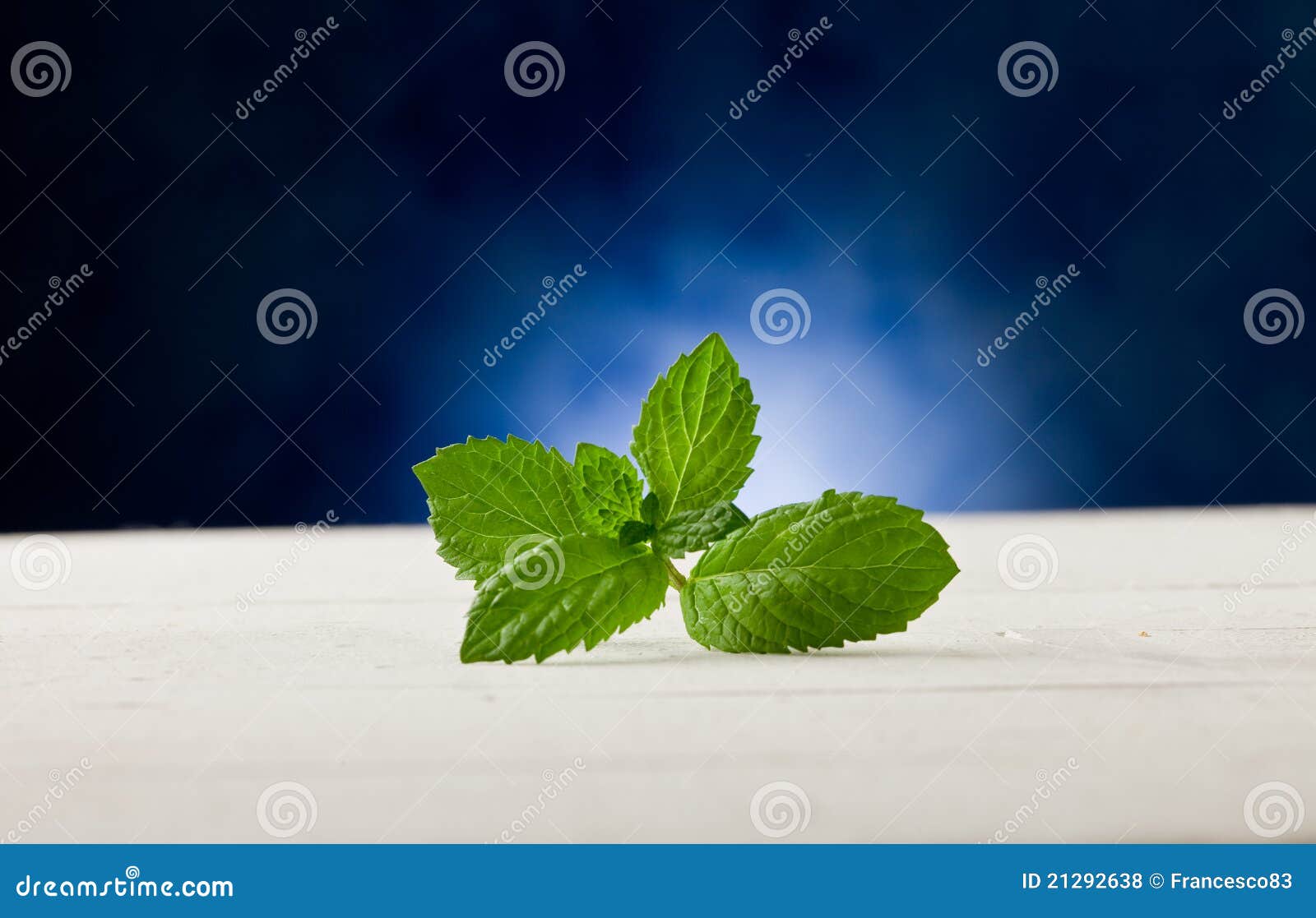 Mint Leaves on Wooden Table with Spot Light Stock Photo - Image of ...
