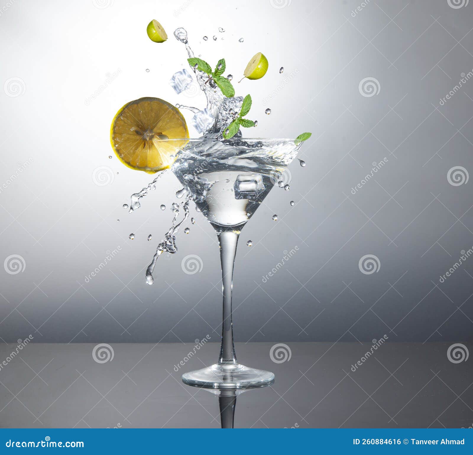 Mint Splash Juice with Lemon Floating Around Stock Photo - Image of ...