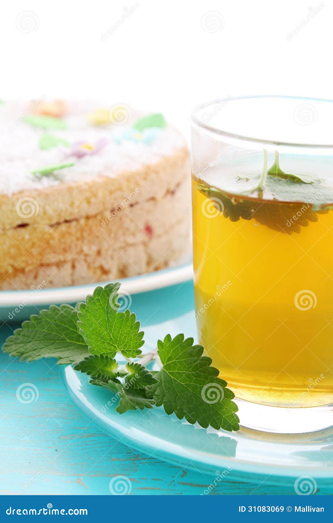 Mint tea and sponge cake stock image. Image of glass - 31083069