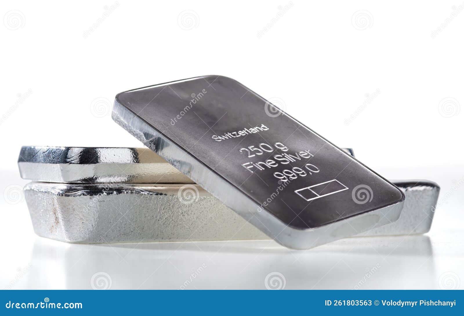 Minted Silver Bar Weighing 250 Grams Against a Background of a Stack of ...