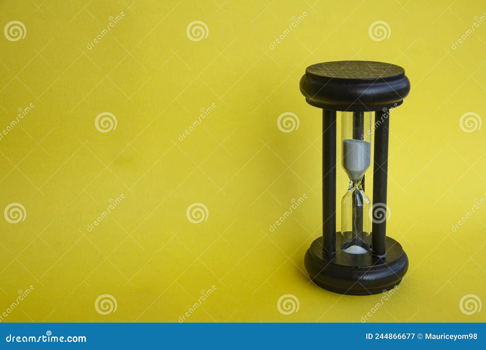 Minute Glass Isolated on Yellow Background. Copy Space Concept Stock ...