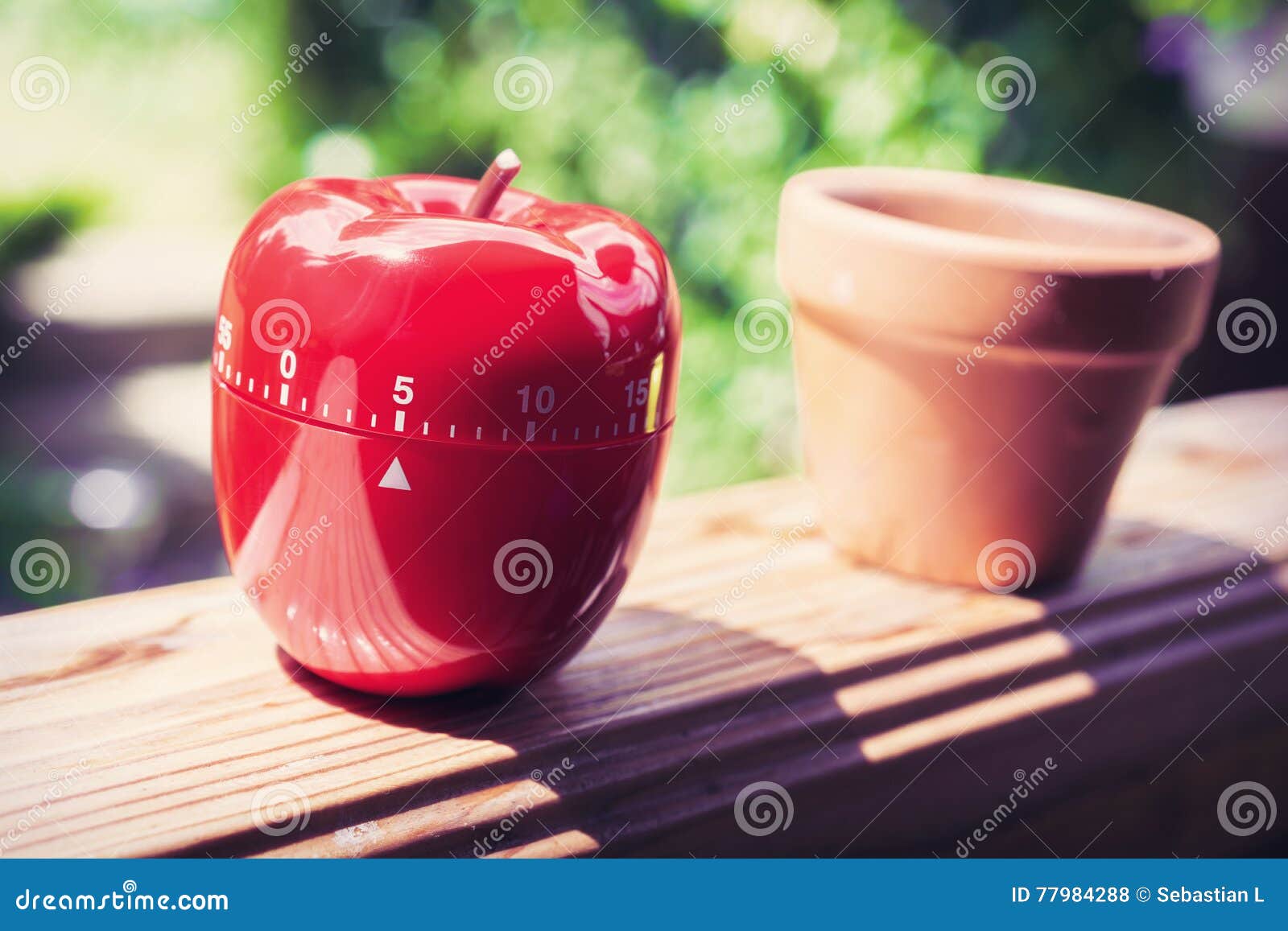 5 Minute Kitchen Egg Timer in Apple Shape Standing on a Handrail Stock ...