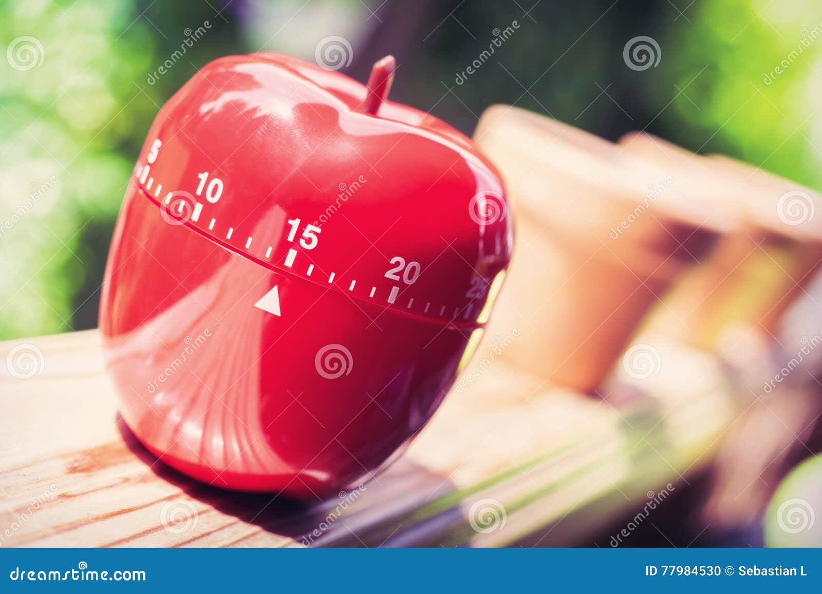 15 Minute Kitchen Egg Timer in Apple Shape Standing on a Handrail Stock ...