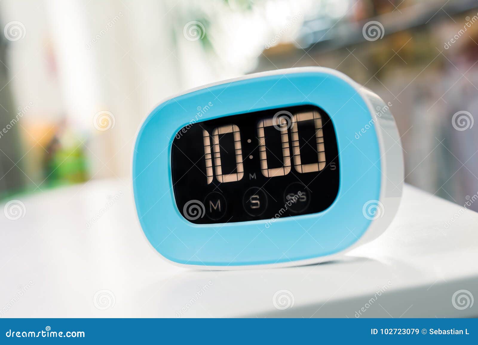 10 Minutes - Digital Blue Kitchen Timer on White Table Stock Image ...