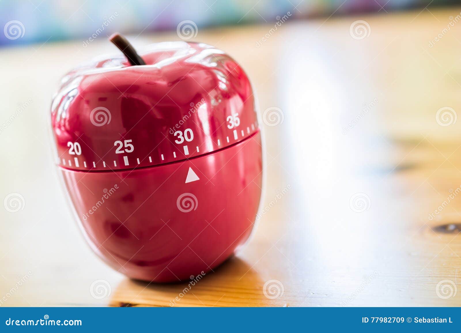 30 Minutes - Kitchen Egg Timer in Apple Shape on Wooden Table Stock ...