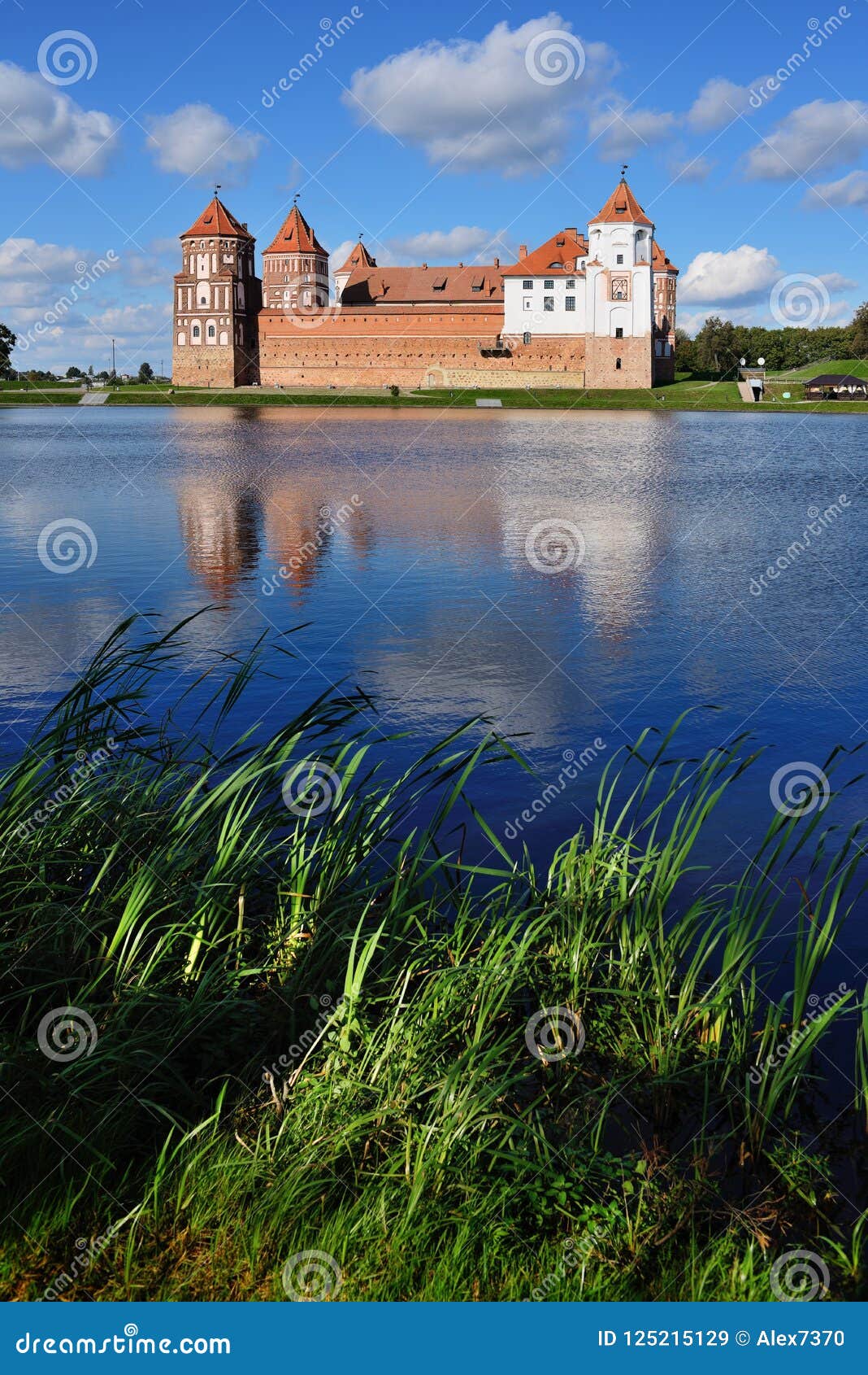 The Mir Castle, Reflected in the Lake. Belarus, Europe Stock Image ...