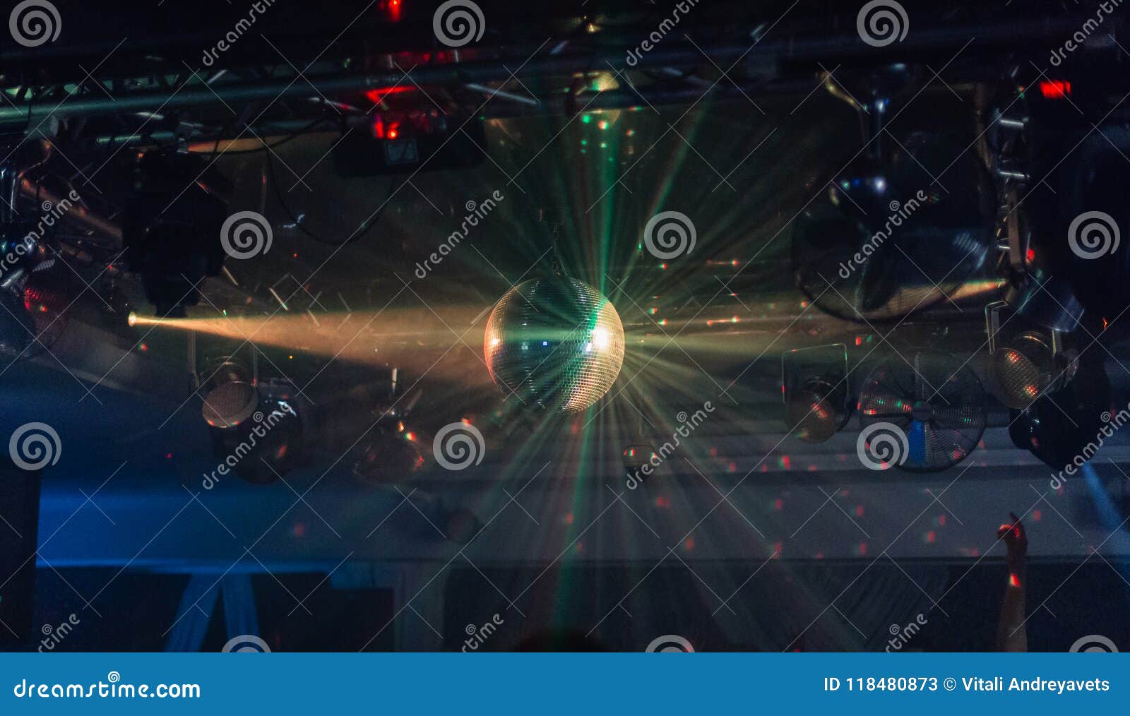 Mirror Ball in a Nightclub with Different Lights. Stock Image - Image ...