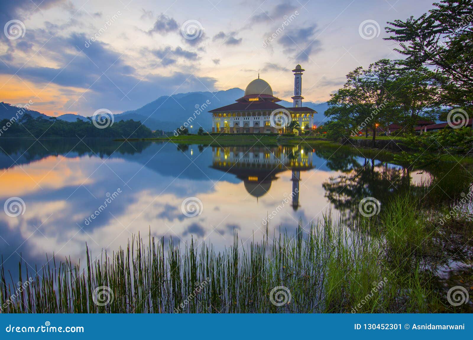Mirror Reflection of Beautiful Mosque during Sunrise. Stock Image ...