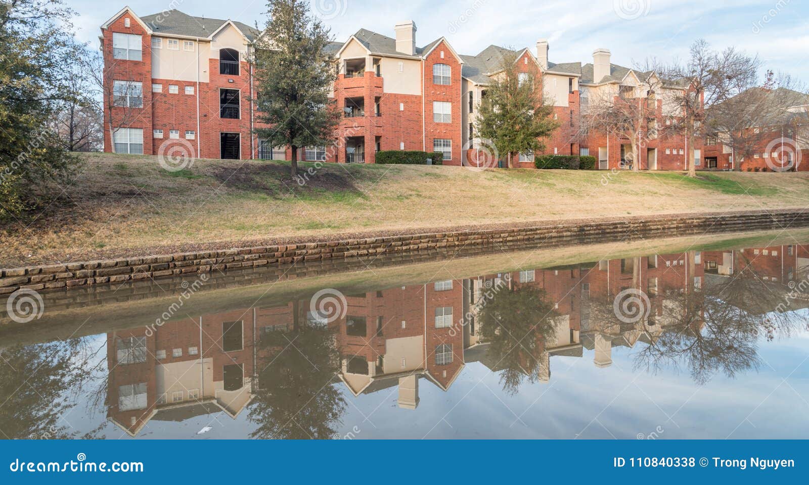Mirror Riverside Apartment Building Complex Reflection at Sunset Stock ...