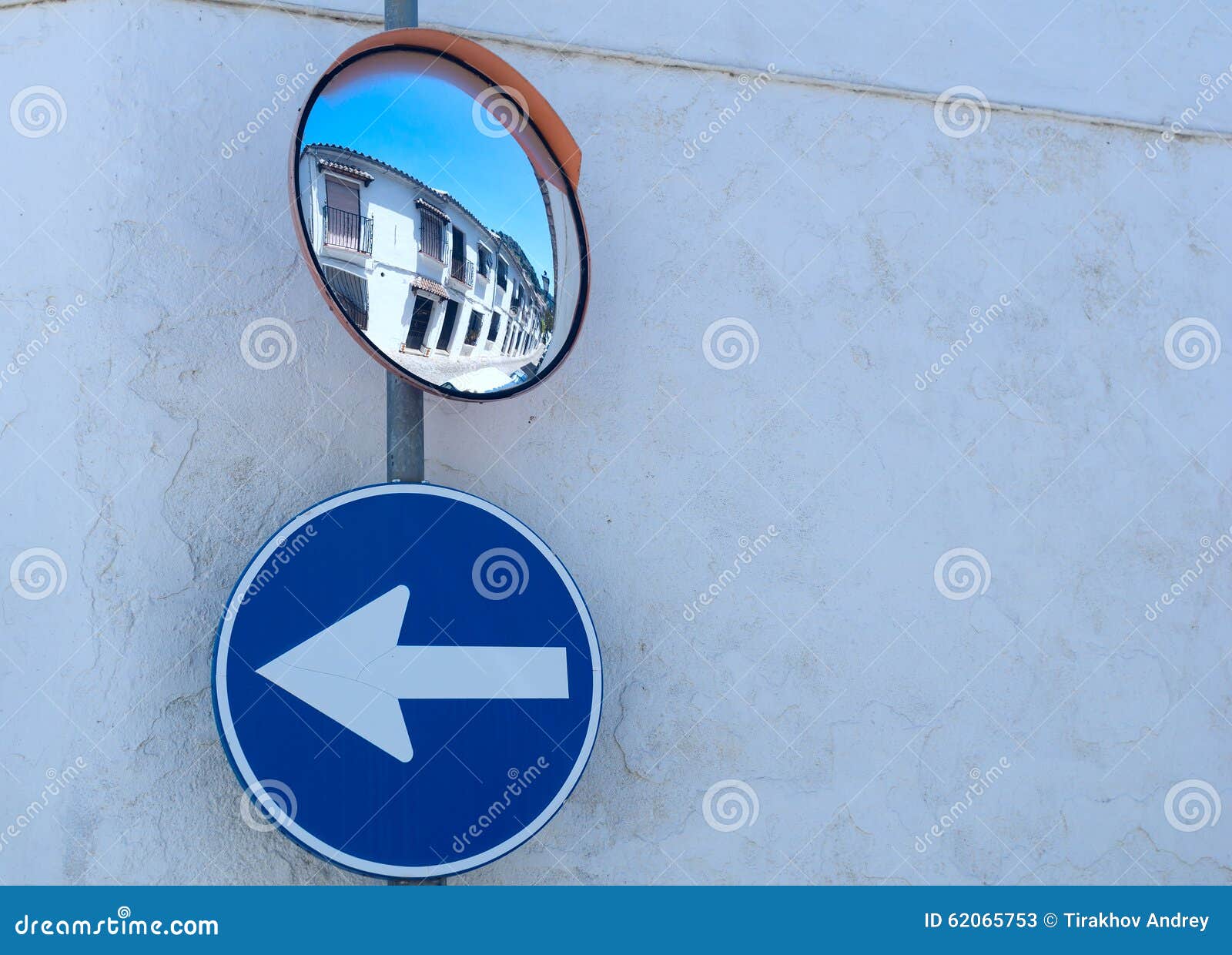 Mirror and Road Sign on the Wall Stock Image - Image of place, double ...