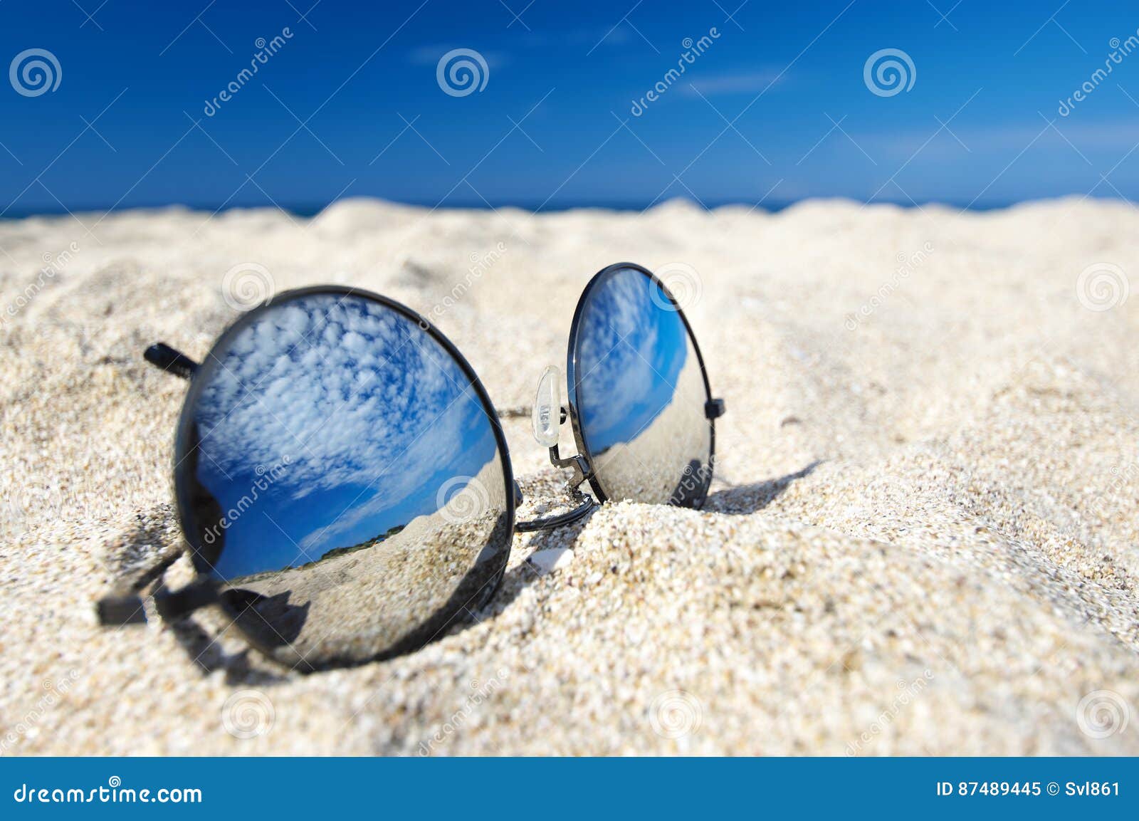 Mirror sunglasses on beach stock image. Image of leisure - 87489445