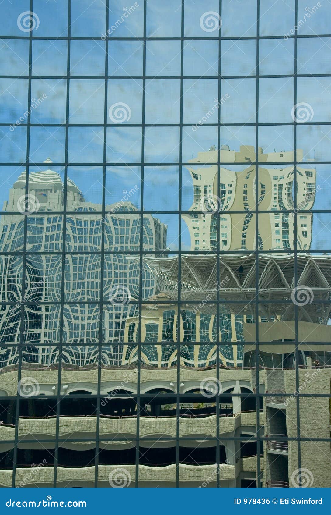 Mirrored Building with Distorted Reflection Stock Photo - Image of ...