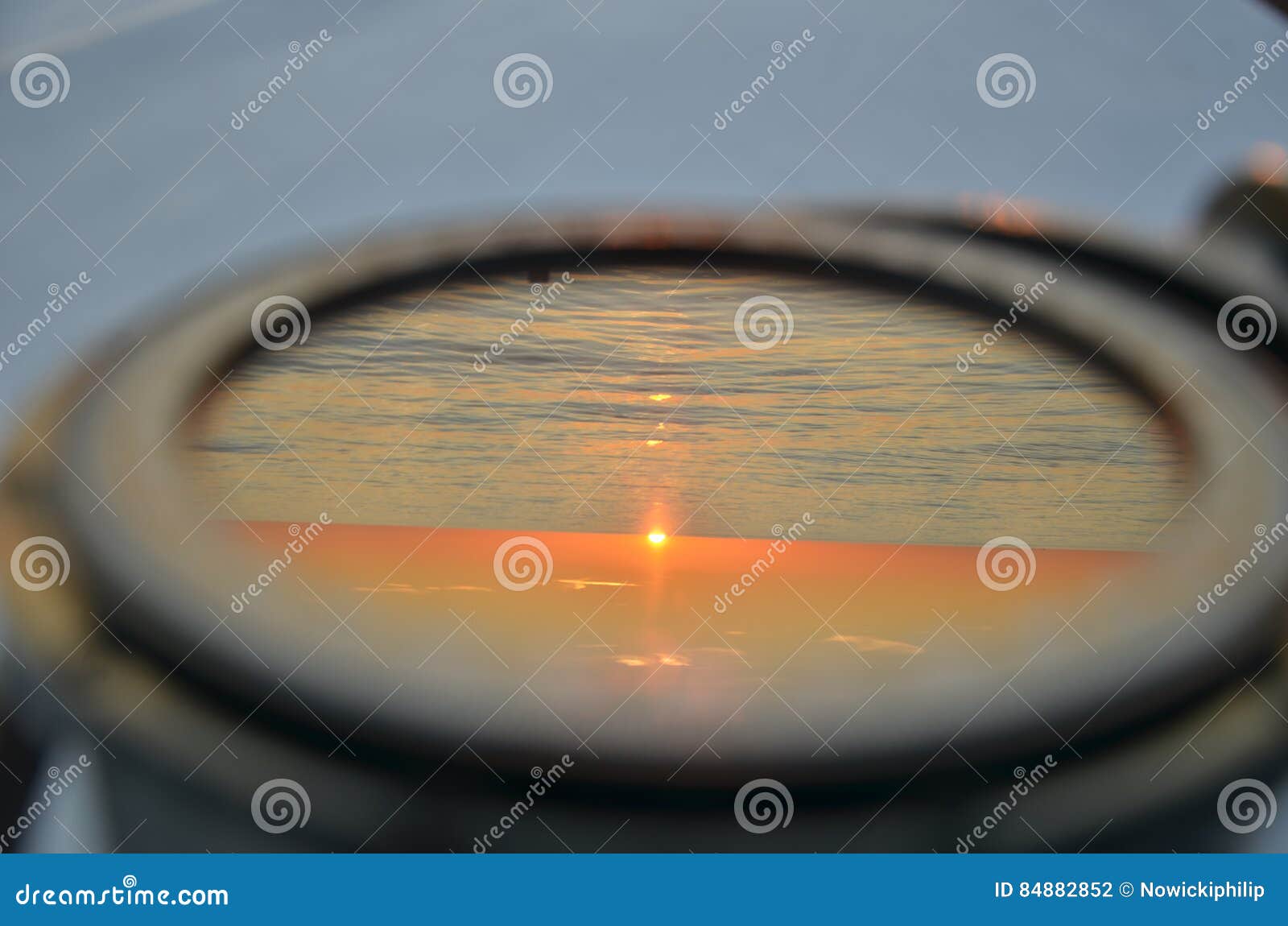 Mirrored sunset in compass stock photo. Image of compass - 84882852