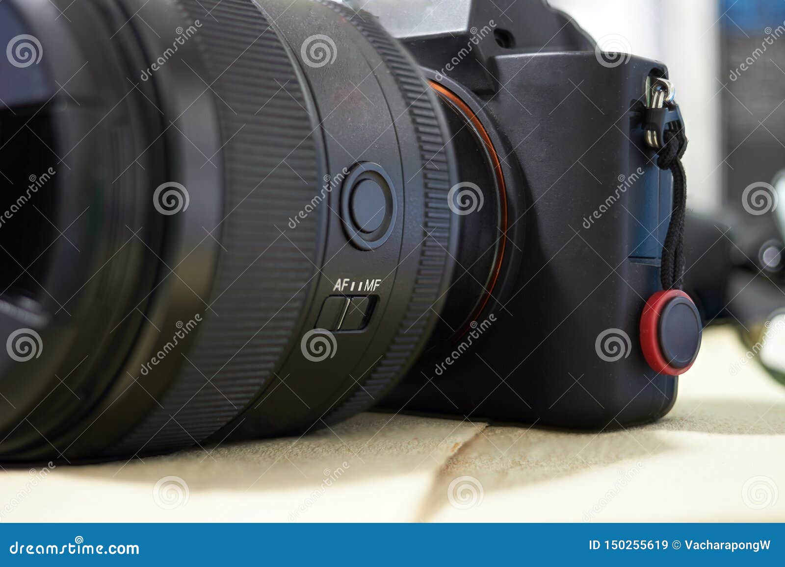 Mirrorless Camera with Lens in Side View on Table Stock Image - Image ...