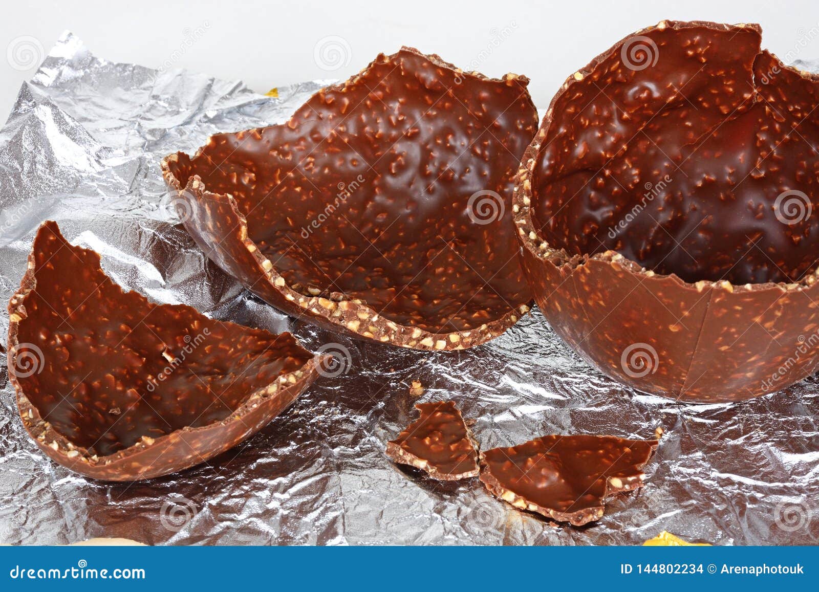Broken Easter egg on foil. stock photo. Image of chopped - 144802234