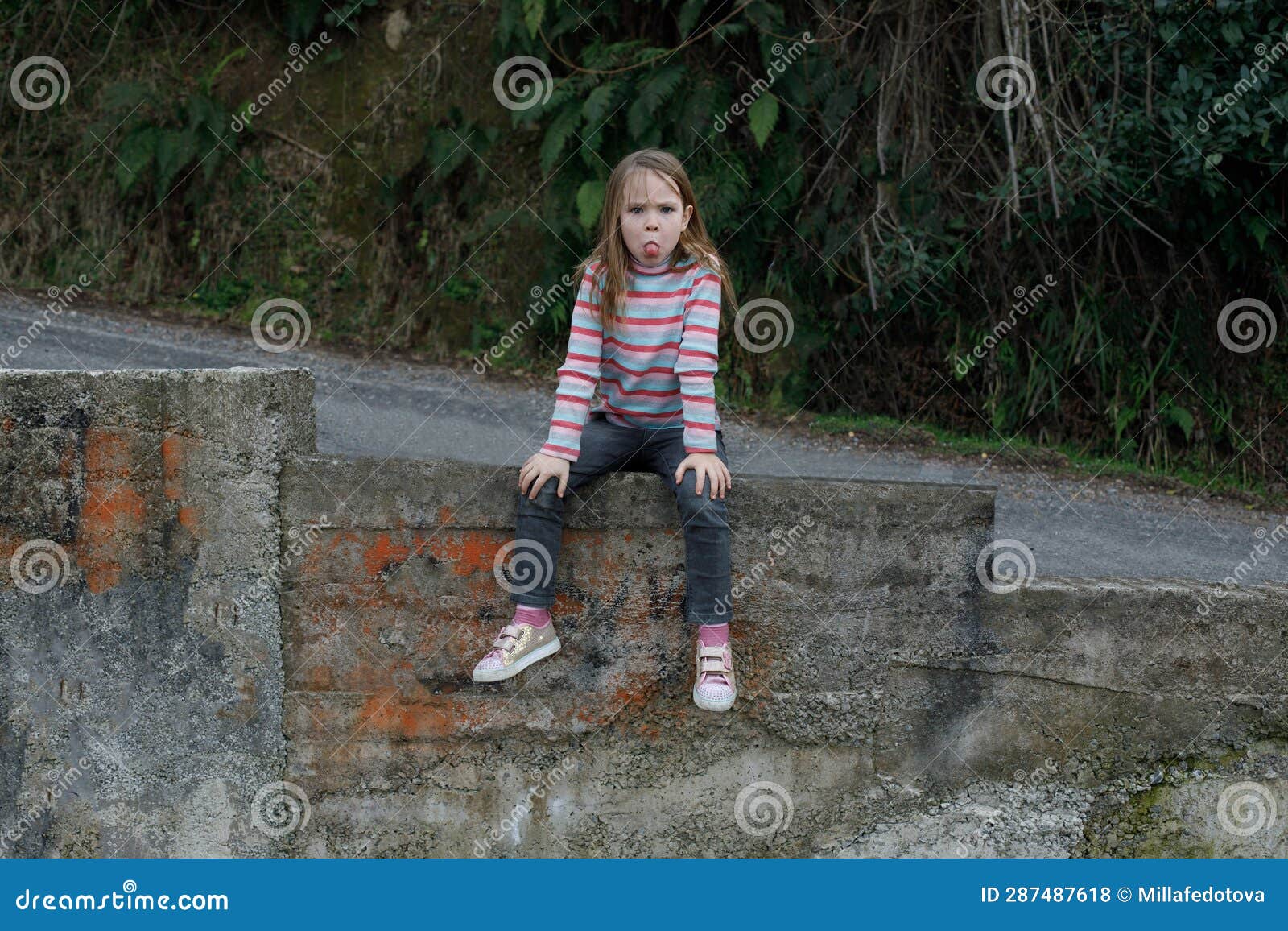 Mischievous Child Girl Grimacing Outdoor Stock Photo - Image of child ...