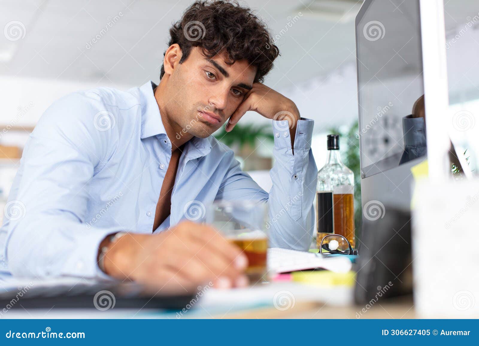 Miserable Businessman at Desk Holding Alcohol Drink Stock Image - Image ...