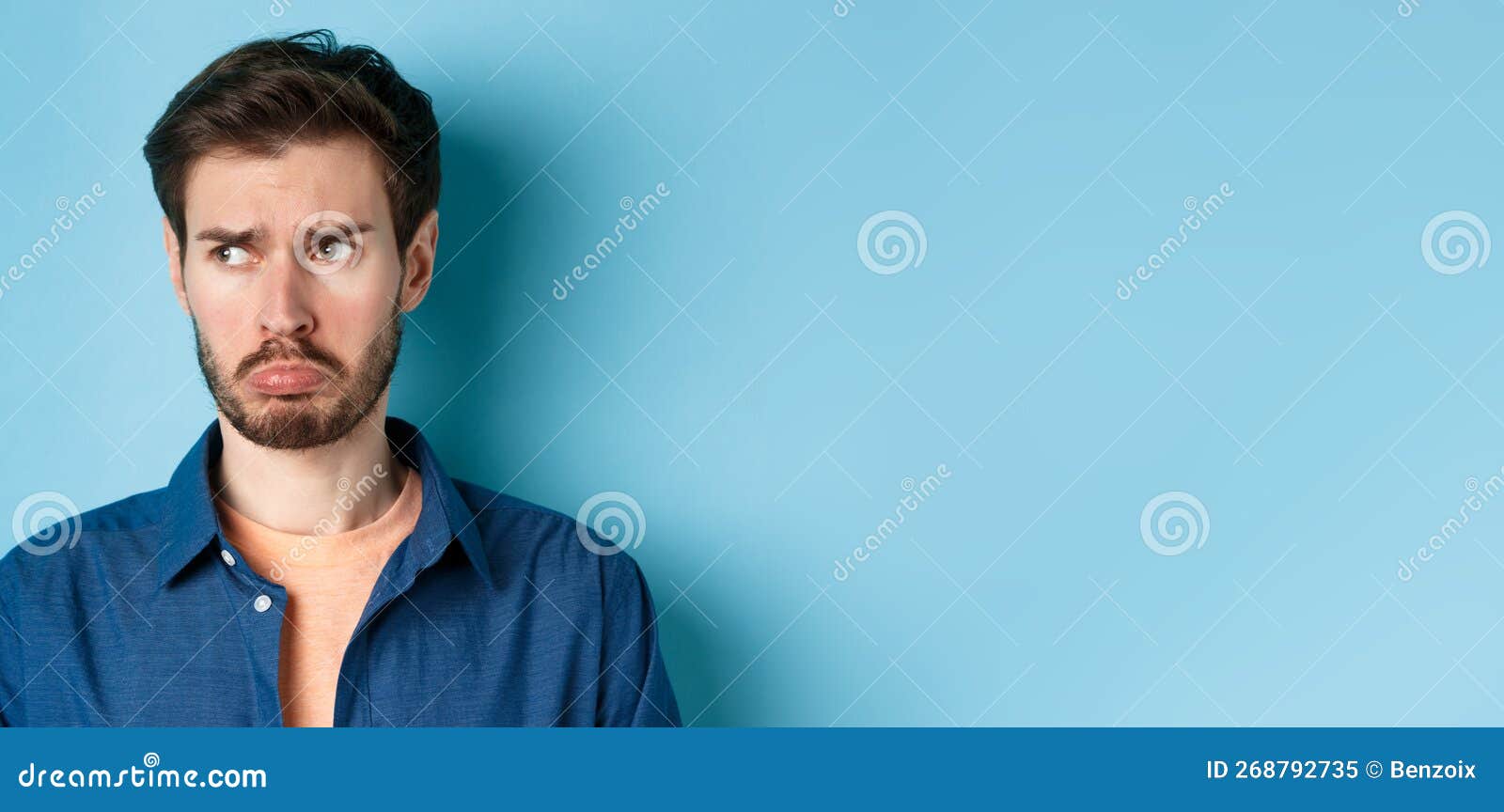 Miserable and Disappointed Guy Acting Childish, Sulking and Looking ...