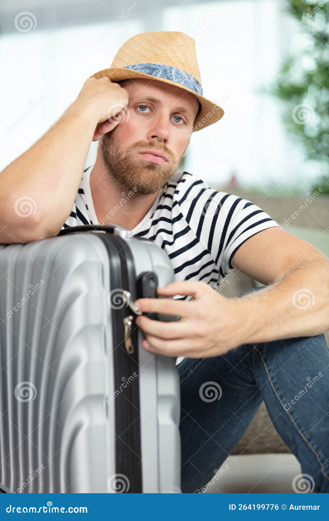 Miserable Man Sat with Suitcase Stock Photo - Image of jeans, worried ...