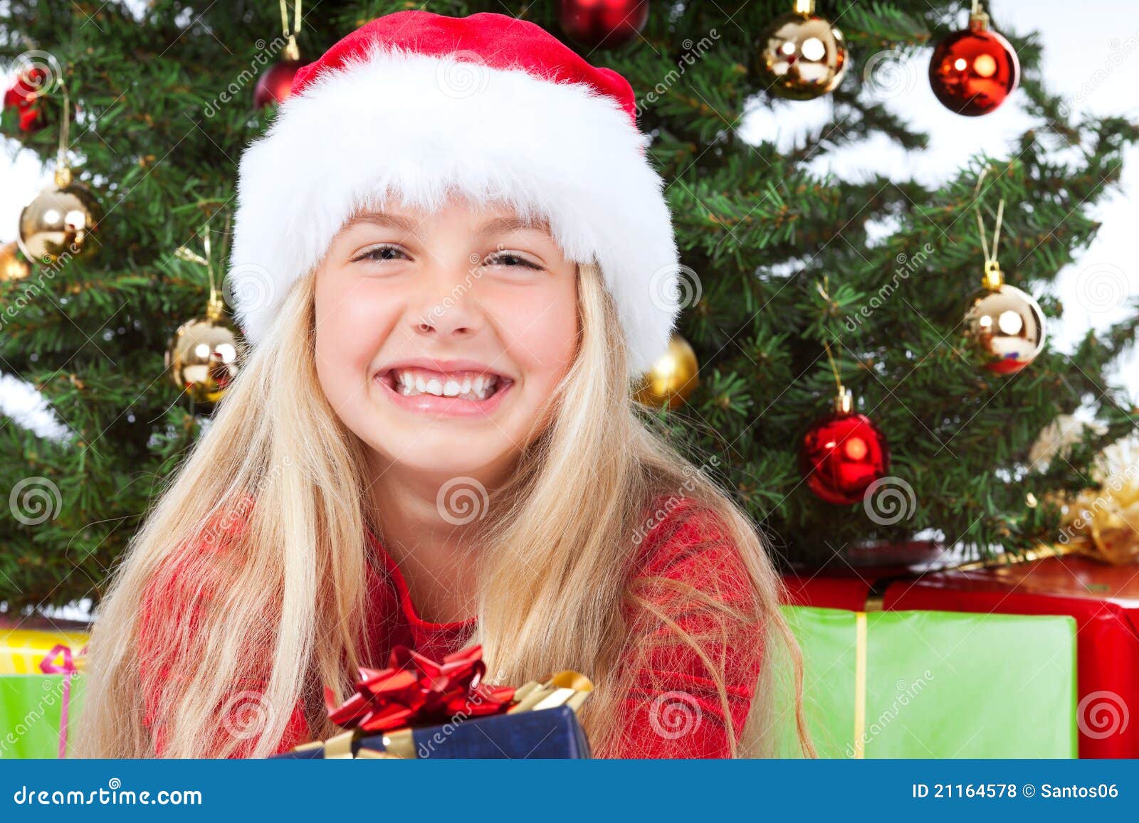 Miss Santa before Christmas Tree and Gifts Stock Photo - Image of ...