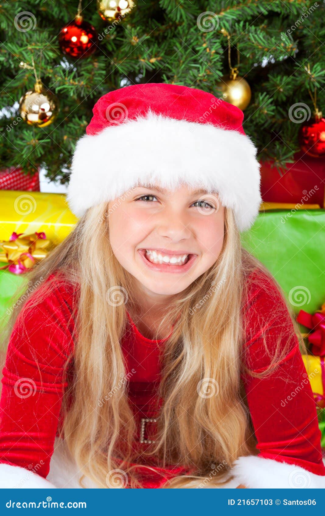 Miss Santa before Christmas Tree and Gifts Stock Image - Image of ...