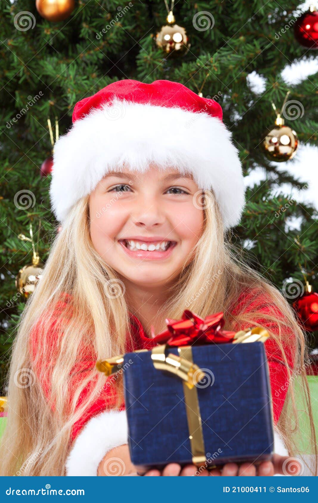 Miss Santa Holding a Gift and Smiling Stock Image - Image of miss ...