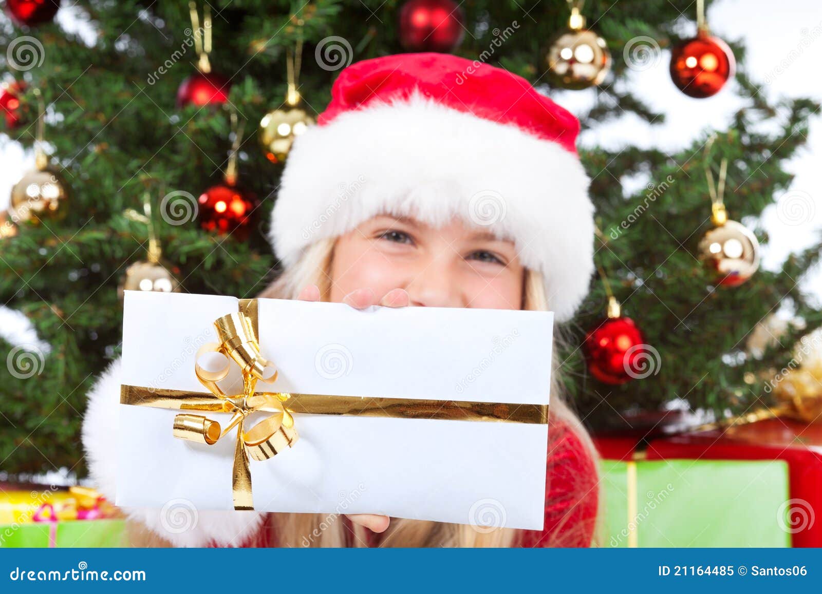 Miss Santa Holding a Gift and Smiling Stock Image - Image of nicholas ...