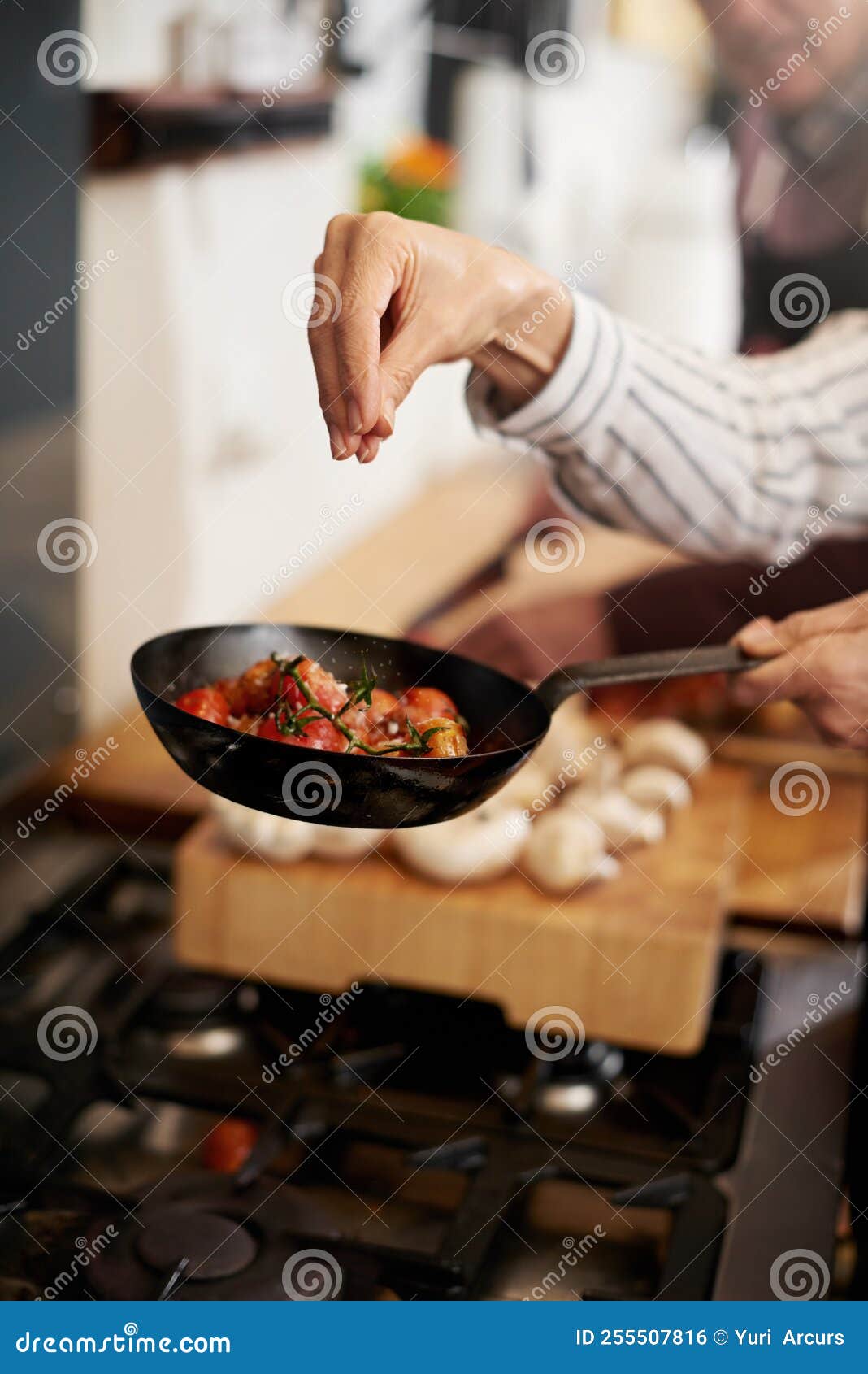 The Missing Ingredient. a Unrecognizable Persons Hand Adding Salt To a ...