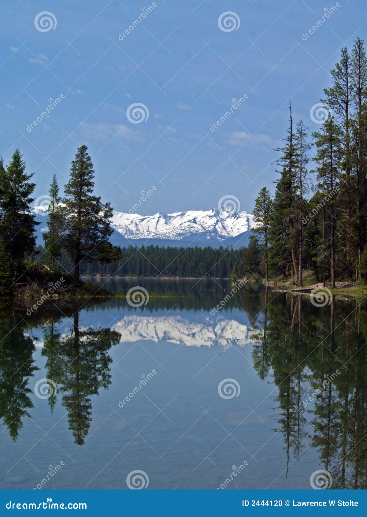 Mission Mts & Holland Lake Stock Photo - Image of snowcapped, shoreline ...