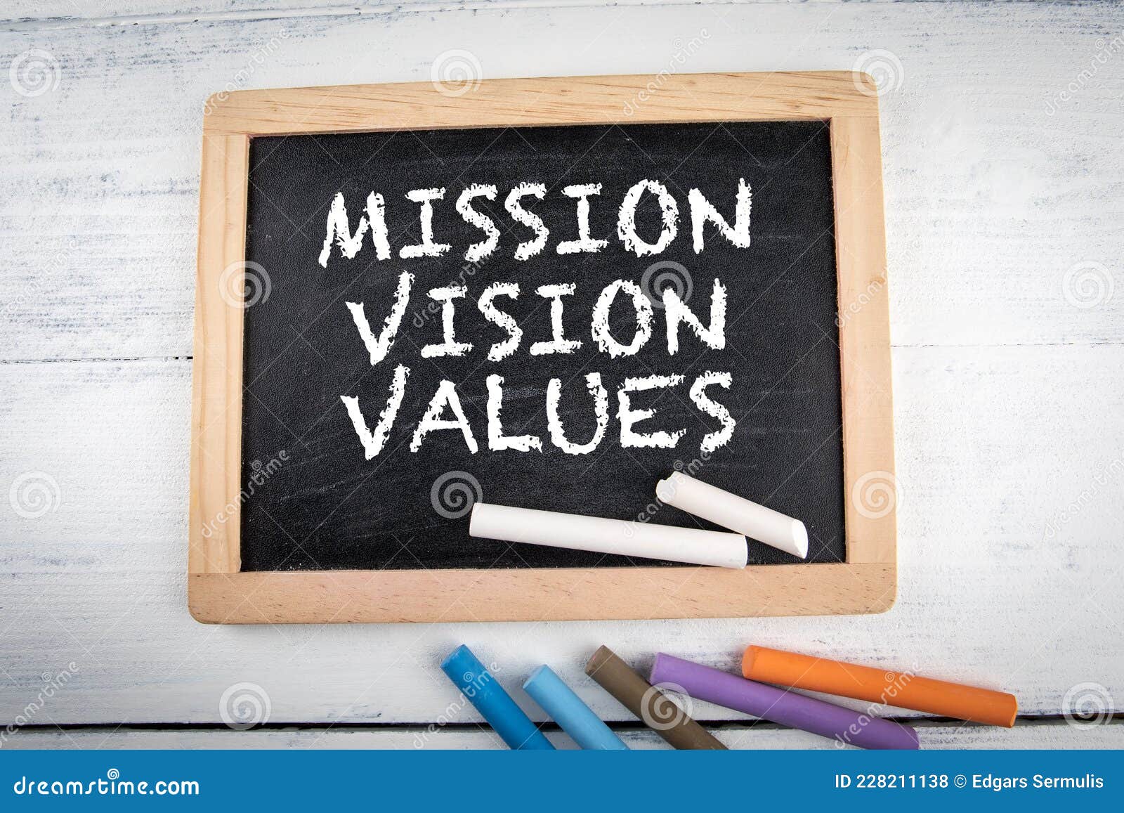Mission Vision Values Concept. Chalk Board and Colored Pieces of Chalk ...