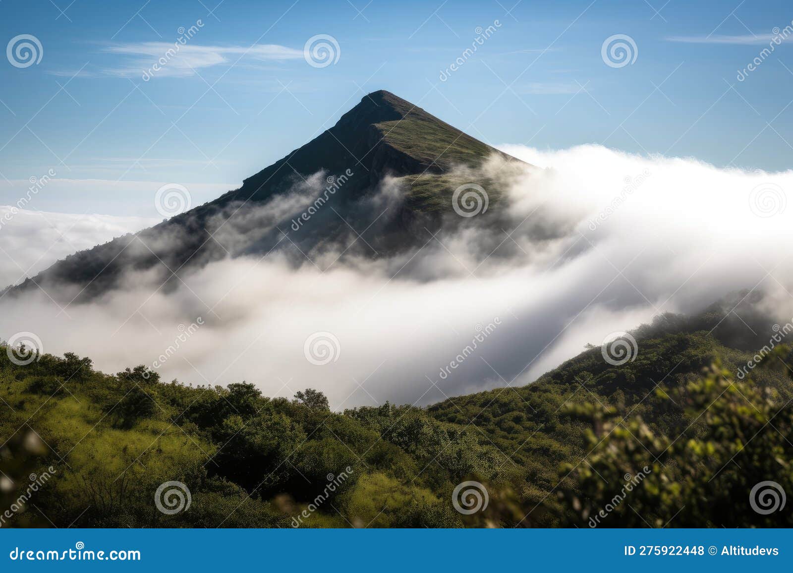 Mist-covered Mountain, with the Peak Visible Above the Clouds Stock ...