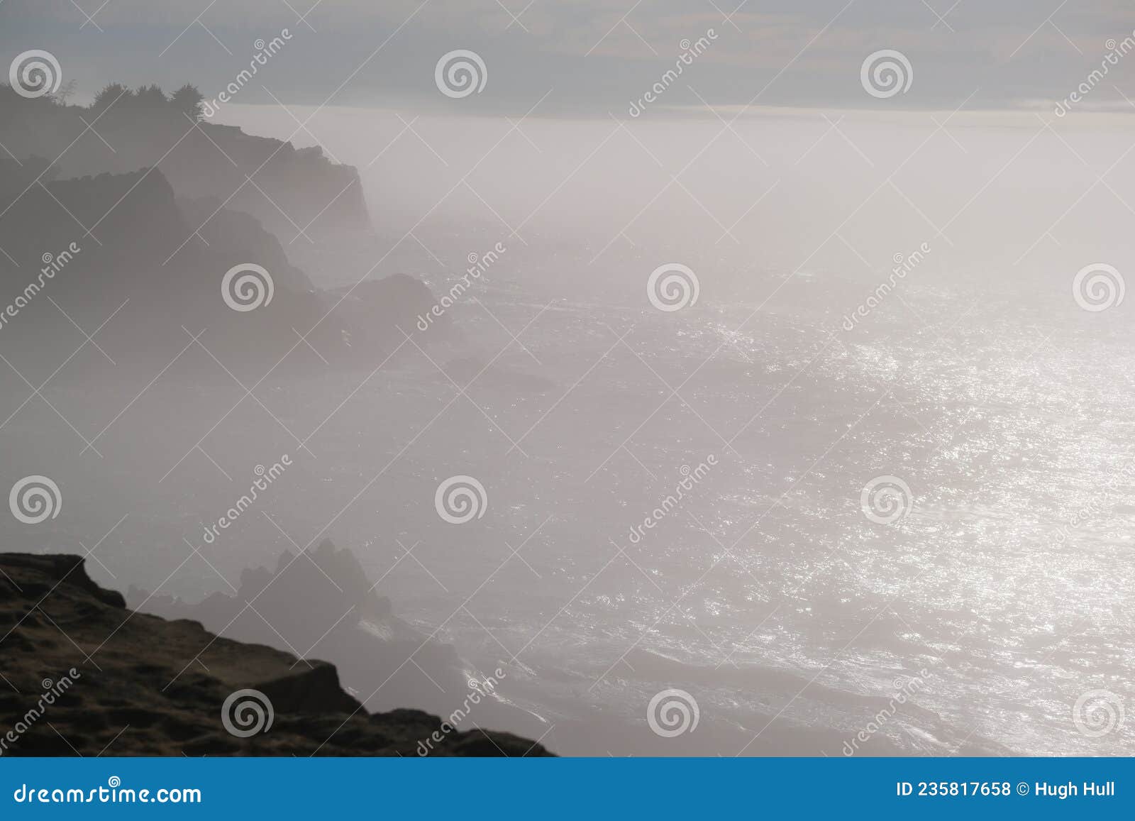 Mist from Crashing Waves Covers the Cliffs Stock Photo - Image of mist ...