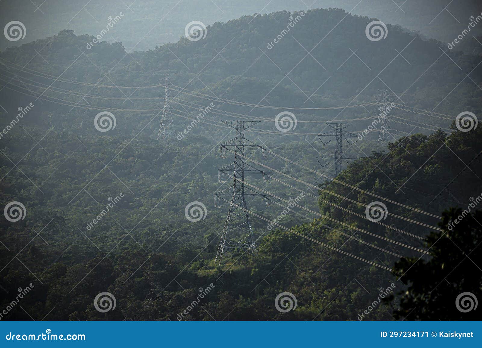 Mist Flows through a Valley and There are Lines of Electrical ...