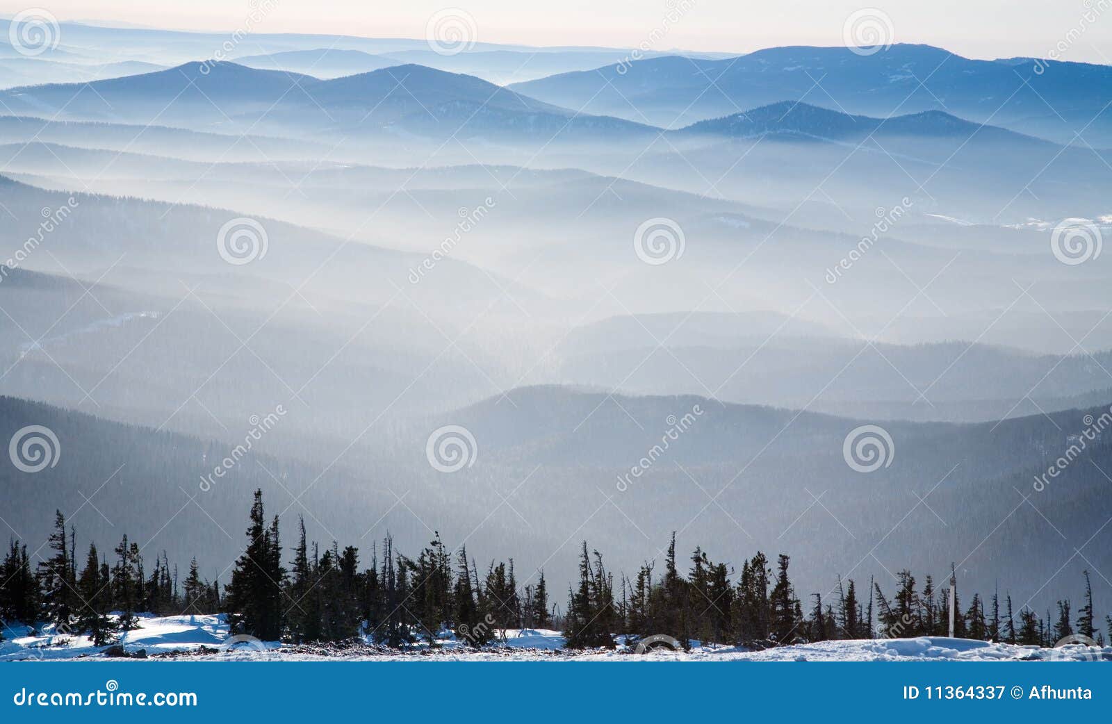 Mist over the mountains stock image. Image of horizon - 11364337