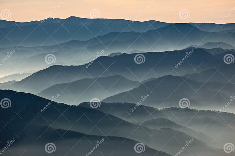 Mist over the mountains stock image. Image of sunlight - 23147165