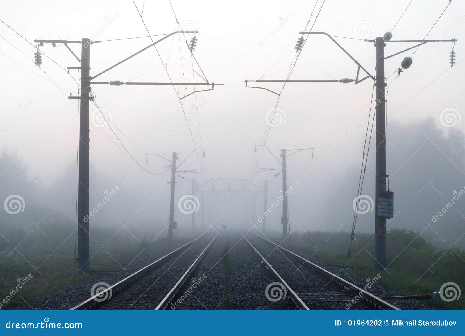 Mist over railway at dawn stock photo. Image of design - 101964202