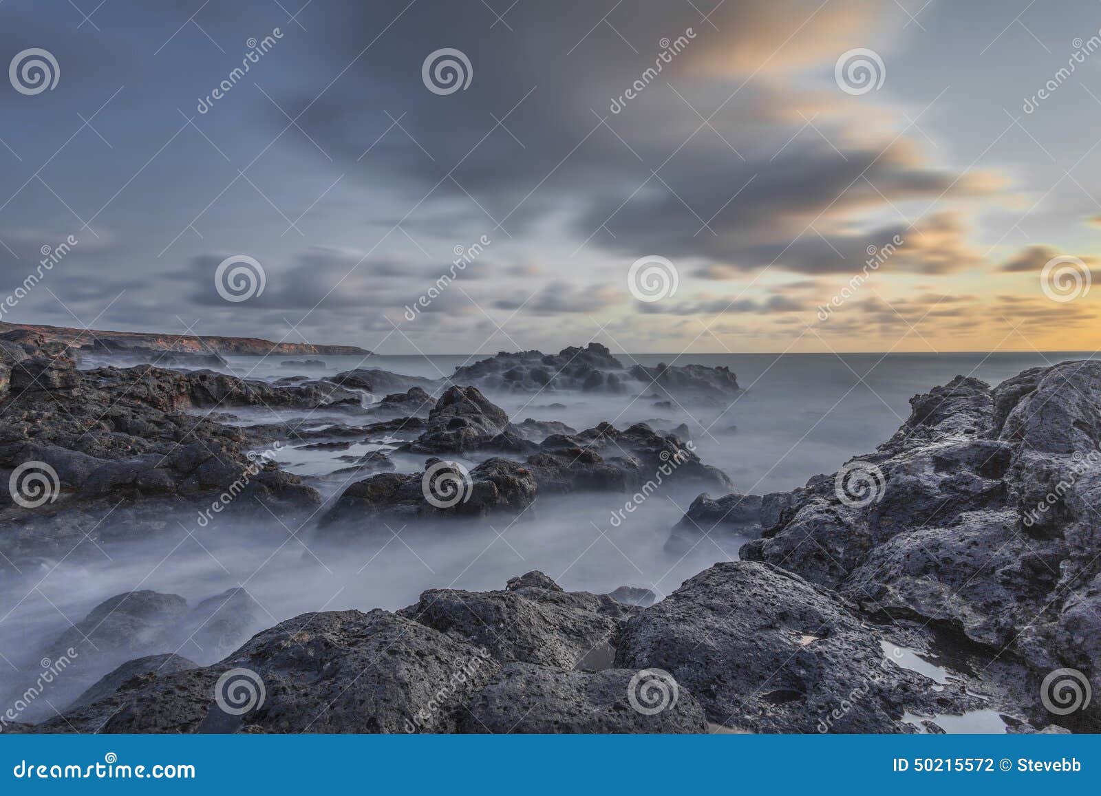 Mist over the rocks stock photo. Image of clouds, waves - 50215572