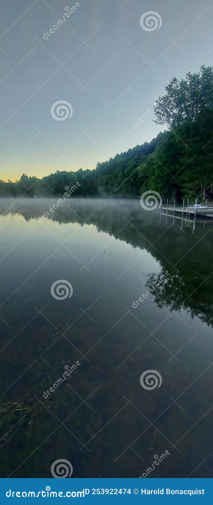 Mist Rising Off of a Lake at Dawn Stock Photo - Image of sunrise, hill ...
