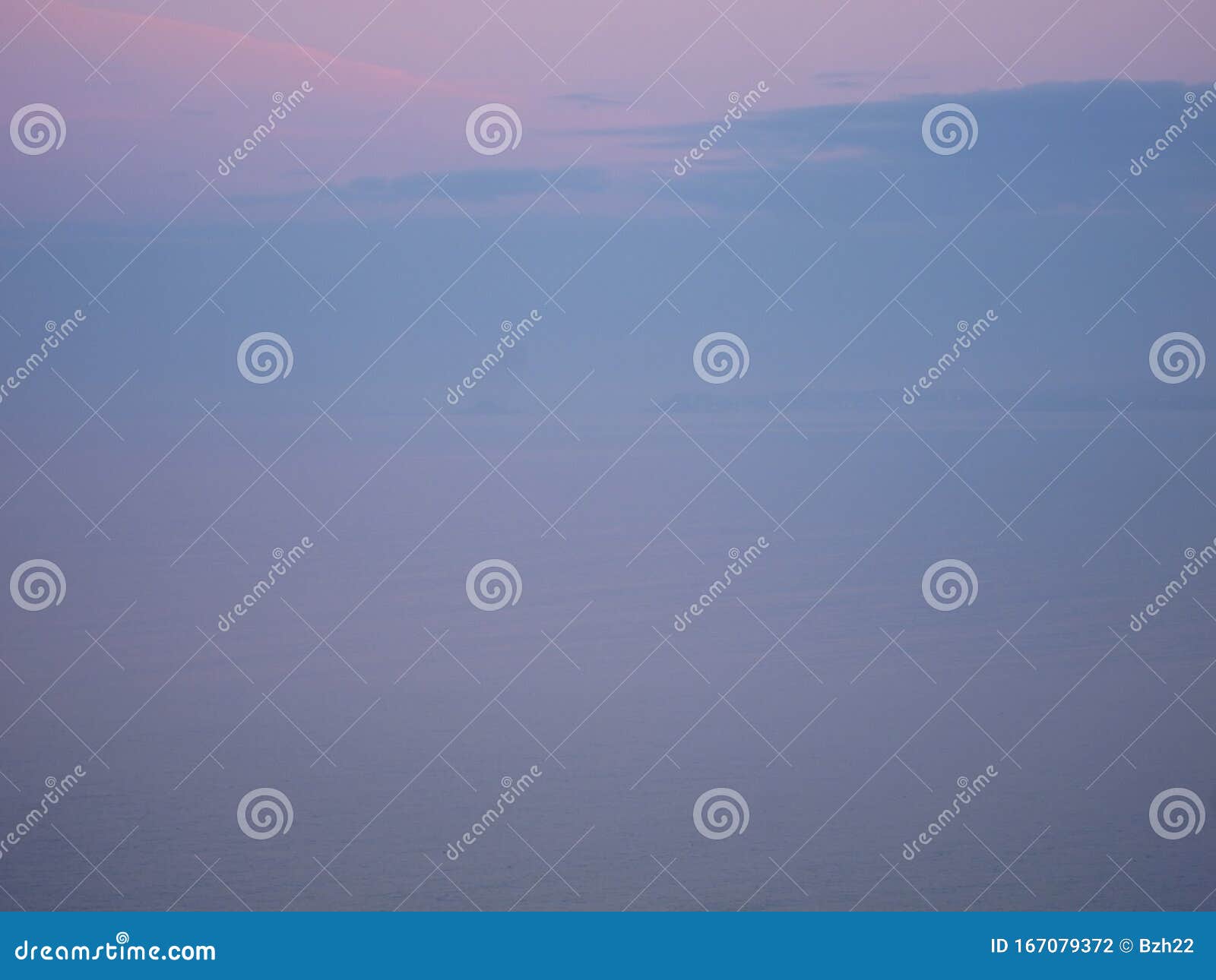 Mist on the sea at sunset stock photo. Image of haze - 167079372