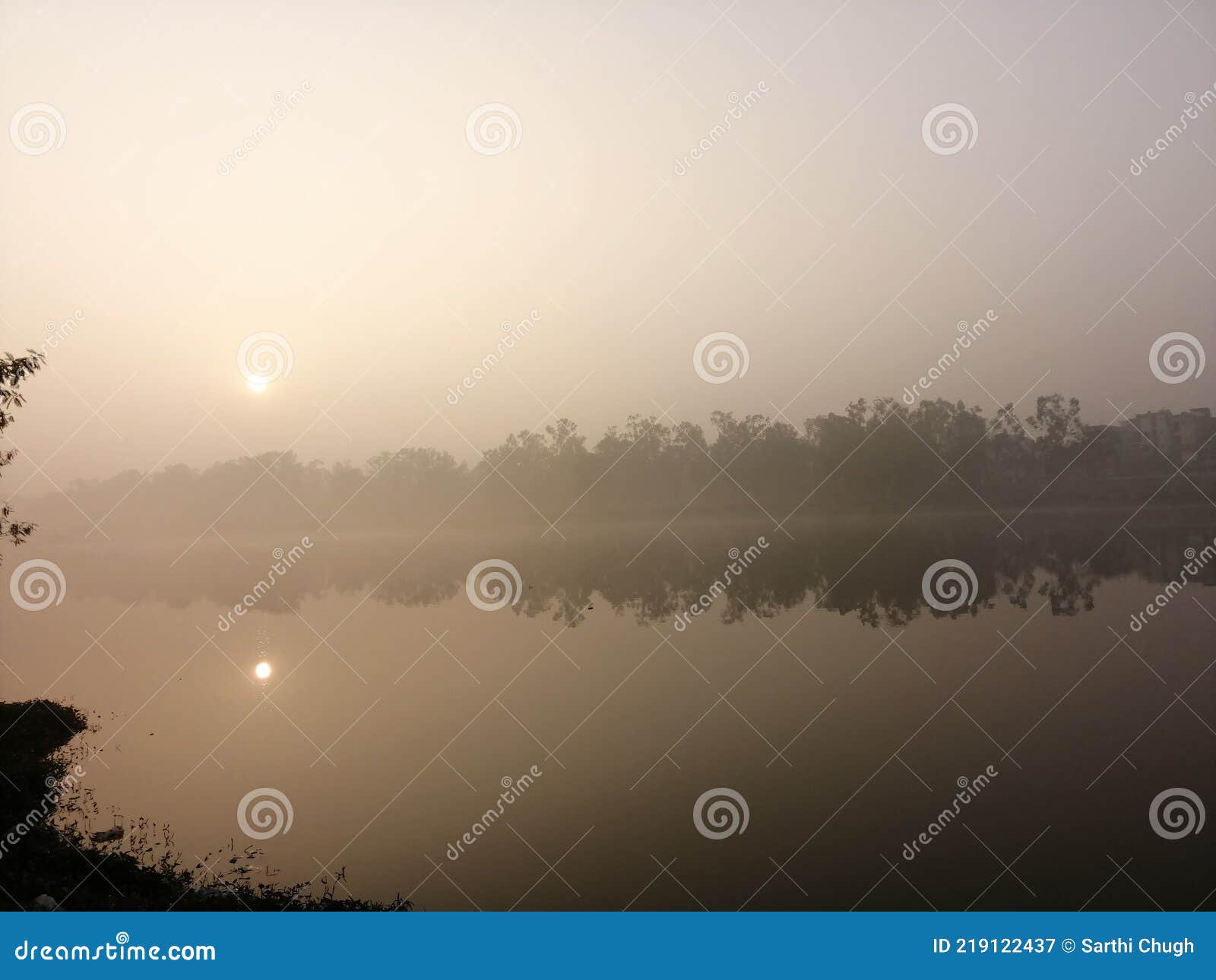 Hazy Polluted Skies with Smog Over a Lake in Delhi in India during ...