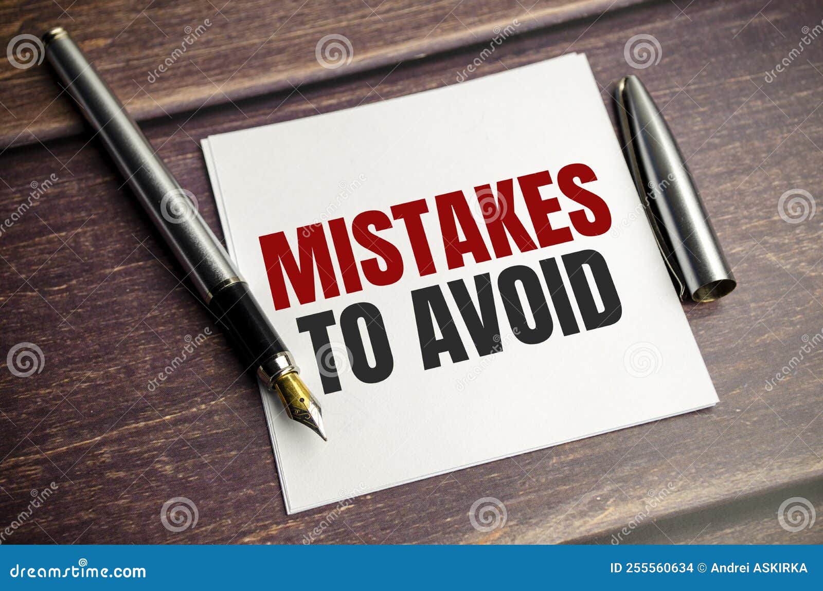 Mistakes To Avoid Text on the Sticker and Wooden Background Stock Photo ...